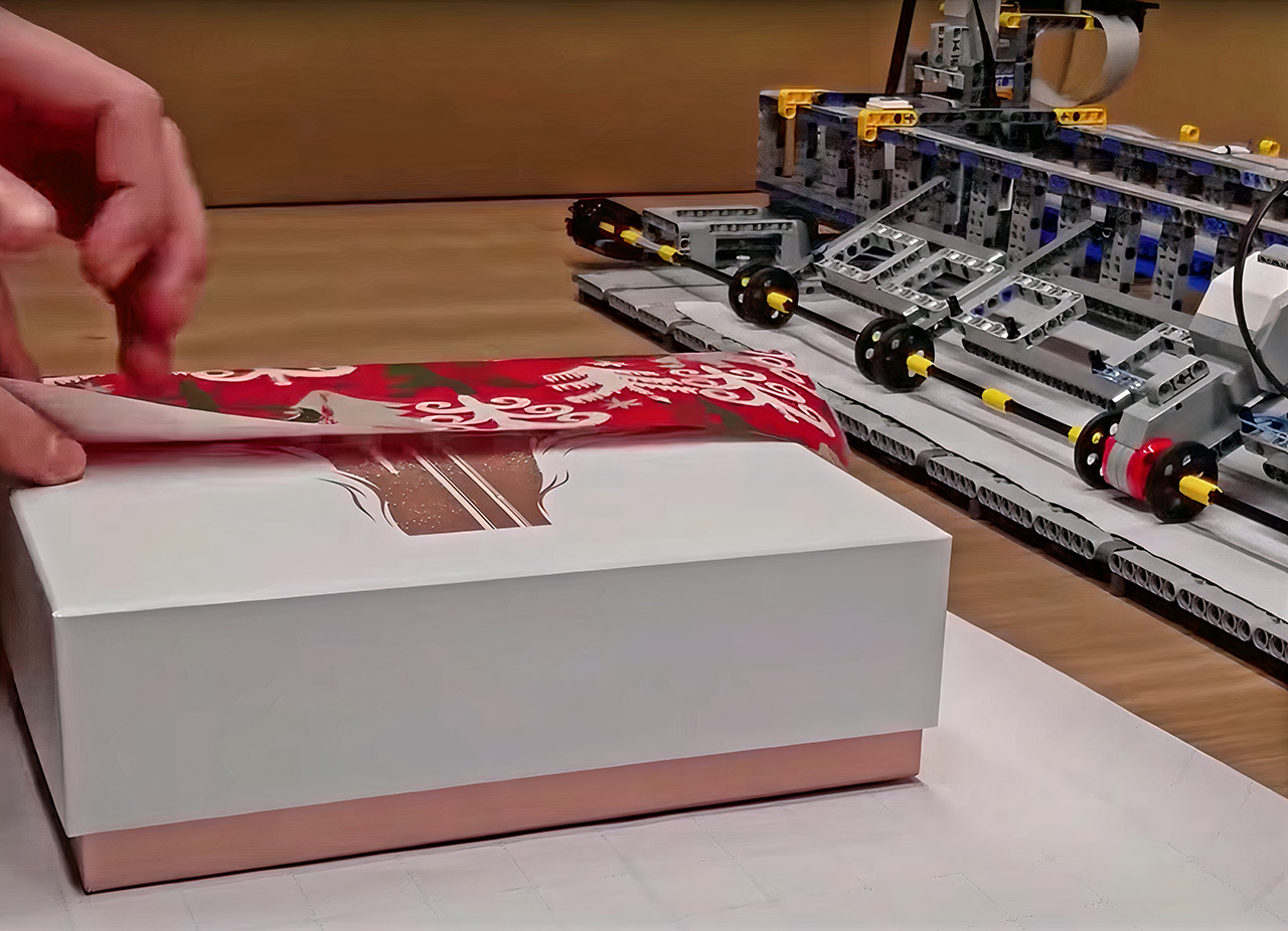 Innovative LEGO Machine Automatically Measures Presents and Cuts ...
