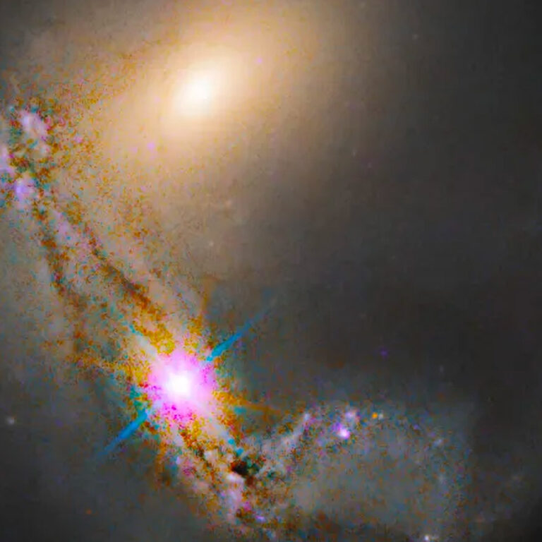 Hubble Captures the Mesmerizing Red Tendrils of the Andromeda Galaxy ...