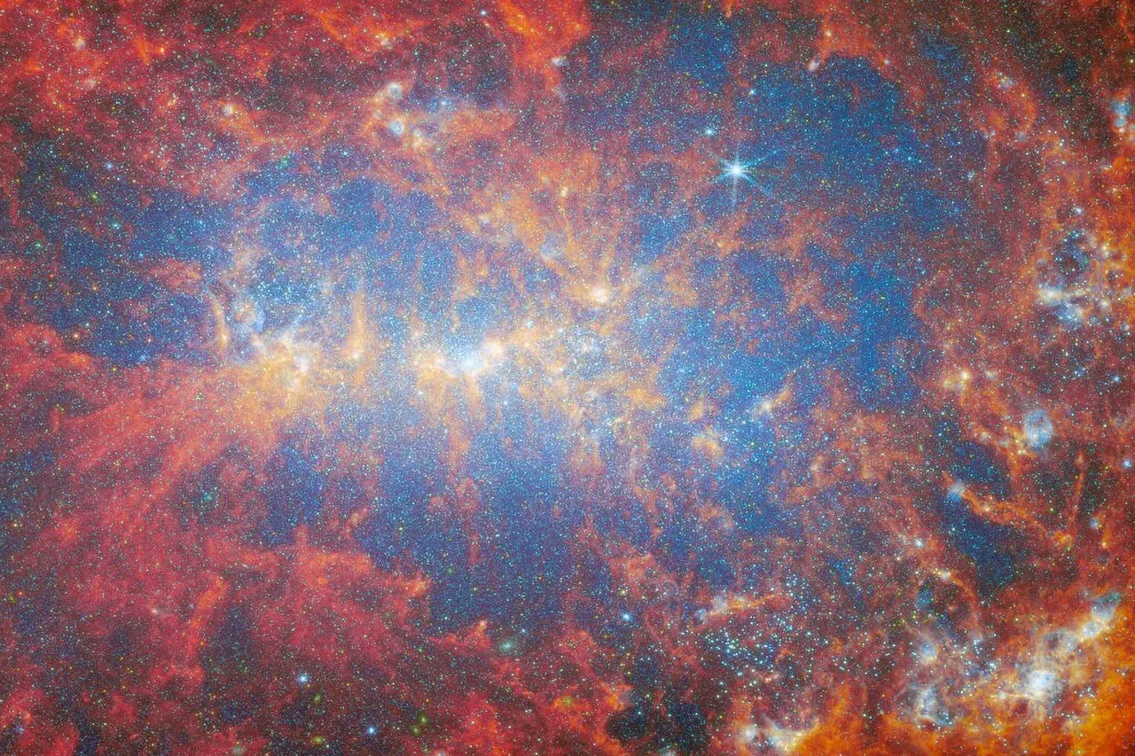 James Webb Space Telescope Captures Dazzling Image of Starburst Galaxy NGC 4449 - TechEBlog