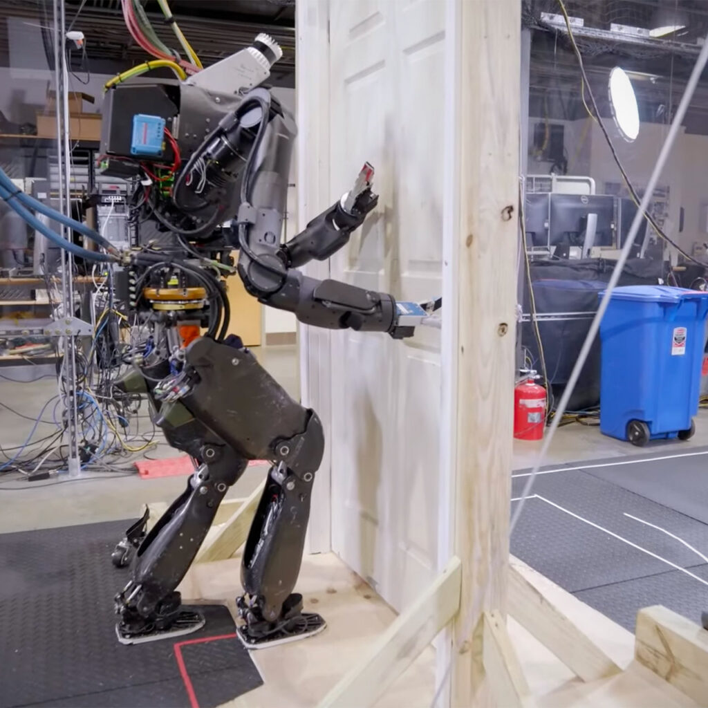 Tesla's Optimus Humanoid Robot Learns New Skills, Dumping Trash ...